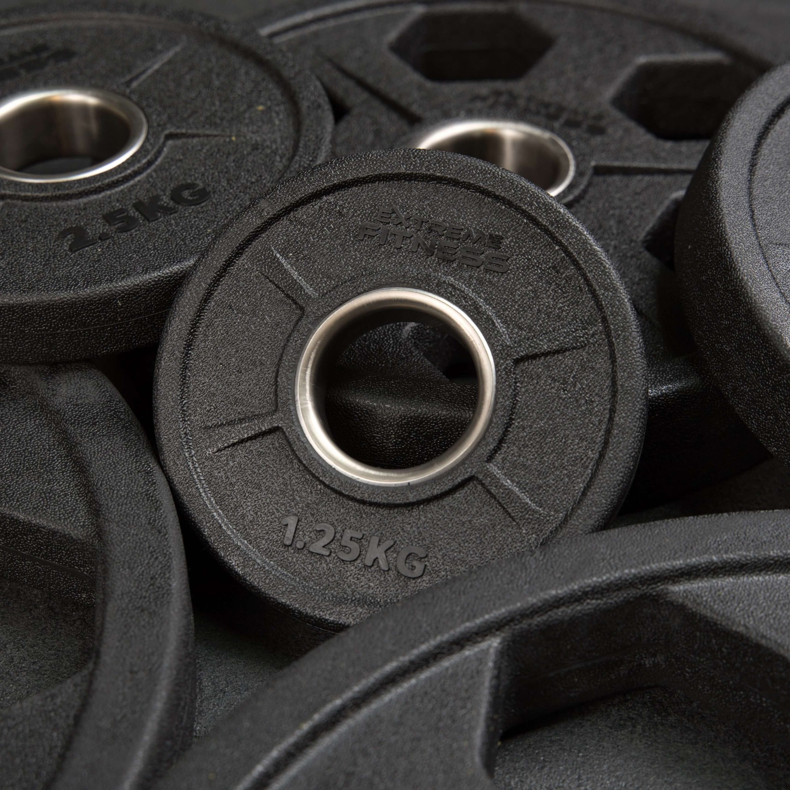 Extreme Fitness Rubber Olympic Weight Plates: Six Shooter